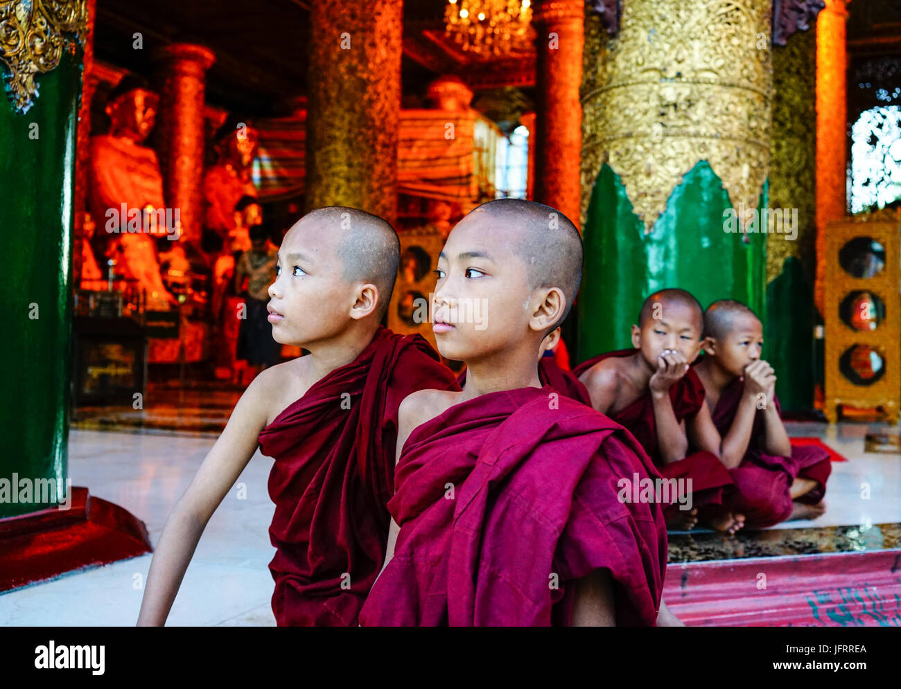 Novice monks at buddhist shrine hi-res stock photography and images - Alamy