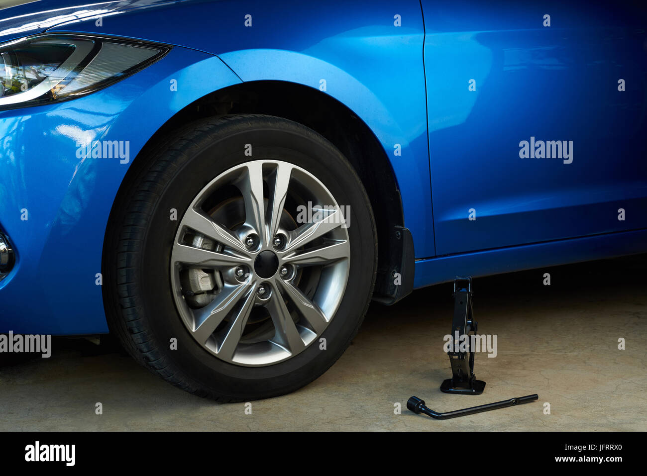 Equipment to install car wheel. Changing car wheel background Stock ...