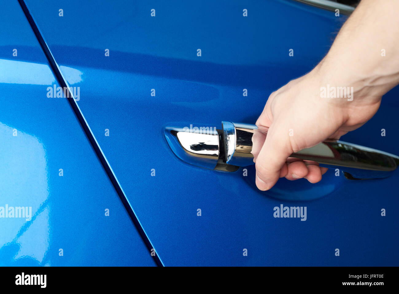 Man opening car door close-up. Chrome metal car handle Stock Photo - Alamy