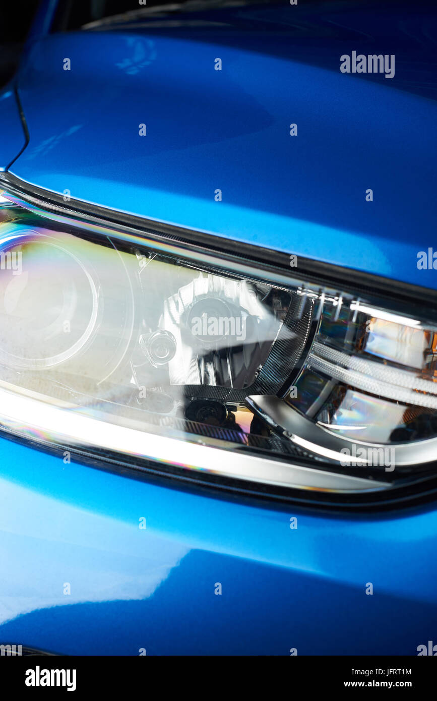 Close-up of new car headlight. Modern led car front light Stock Photo ...