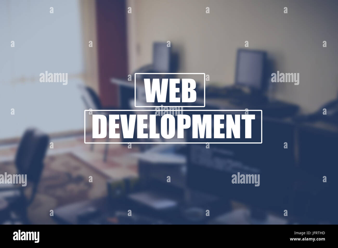 web development with office blurring background Stock Photo - Alamy
