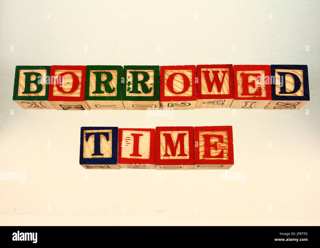 The term borrowed time visually displayed on a white background using ...