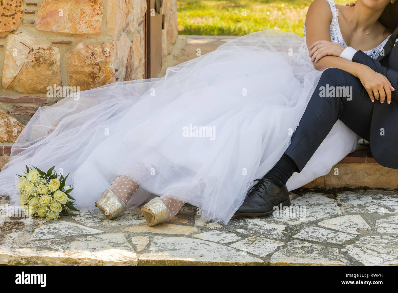 feet of bride and groom, wedding shoes Stock Photo - Alamy