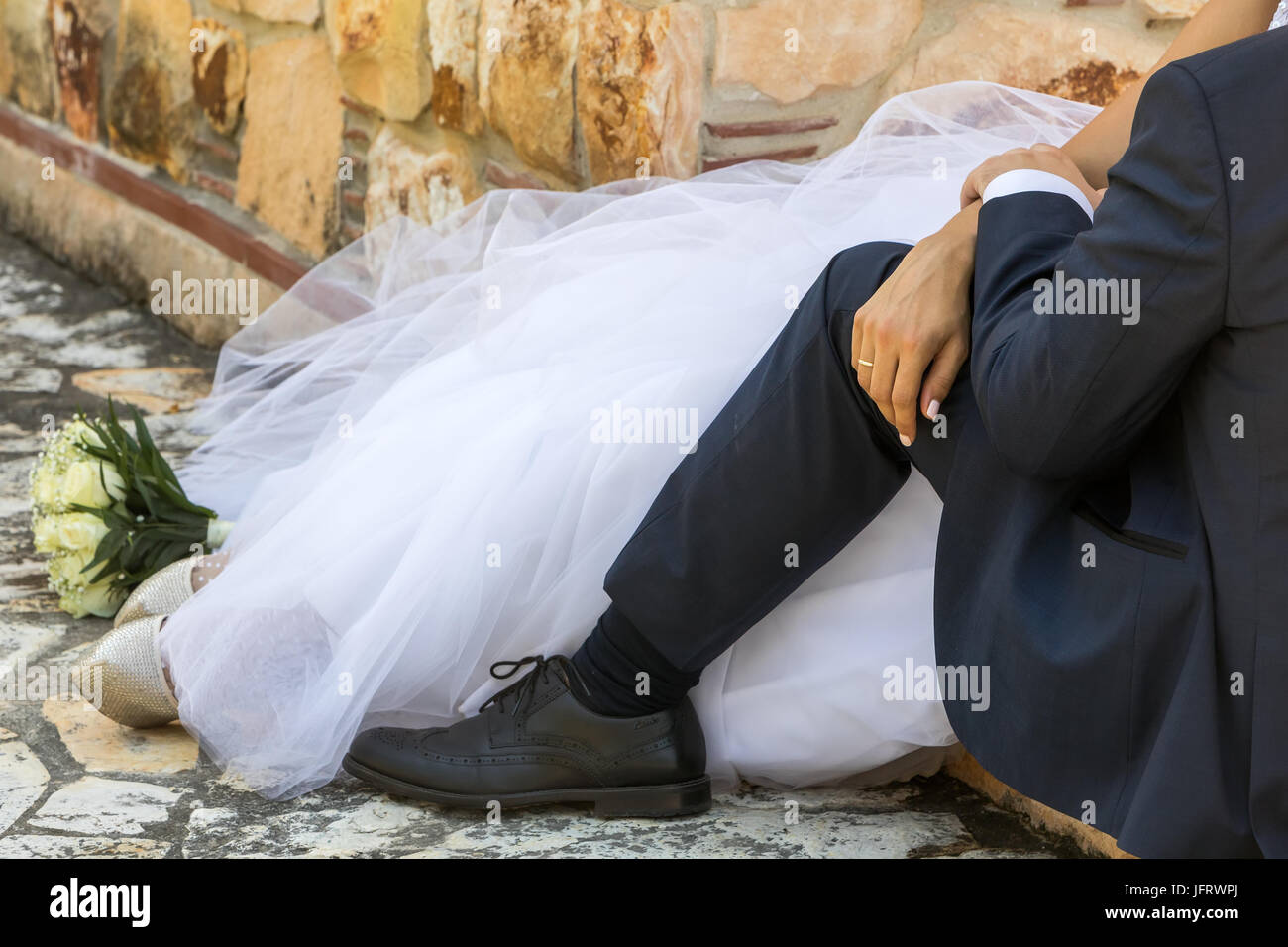 feet of bride and groom, wedding shoes Stock Photo - Alamy