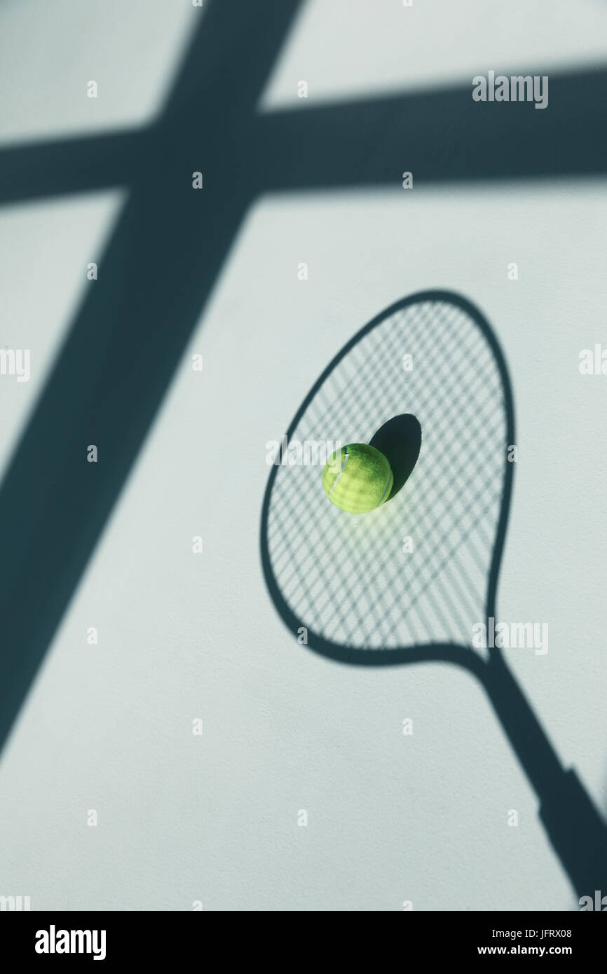 tennis racket and ball on the floor at room with daylight Stock Photo ...