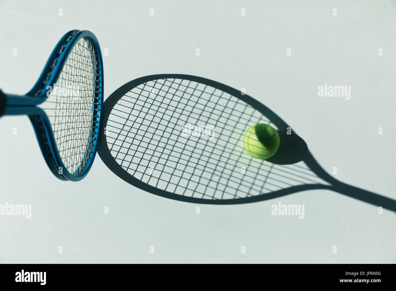 tennis racket and ball on the floor at room with daylight Stock Photo ...