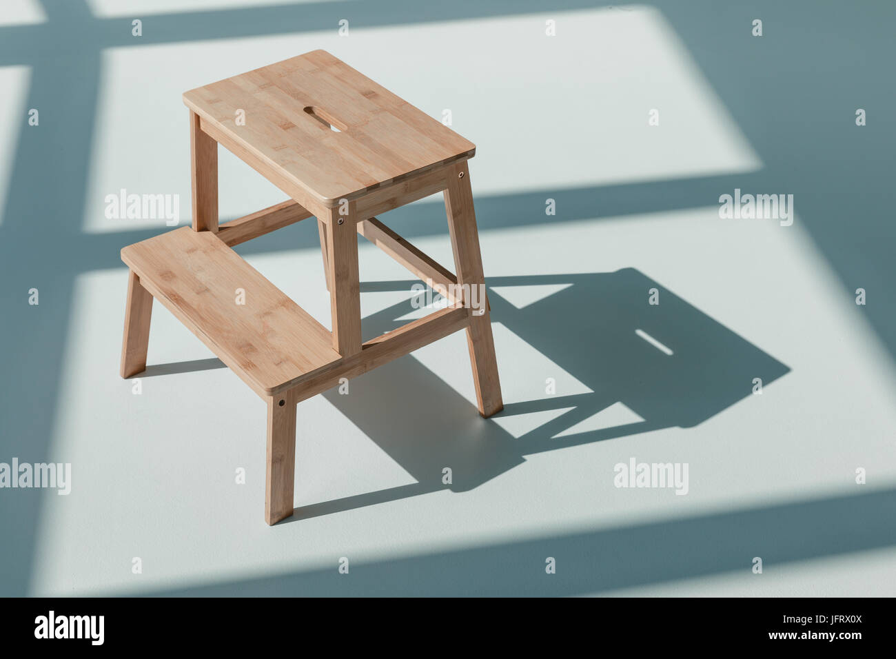 simple wooden flower stand at empty room with daylight Stock Photo - Alamy