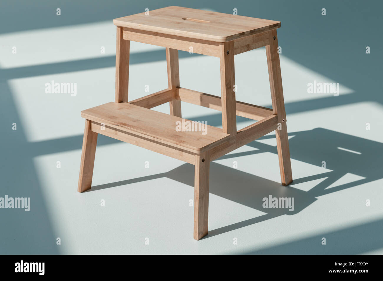 simple wooden flower stand at empty room with daylight Stock Photo - Alamy