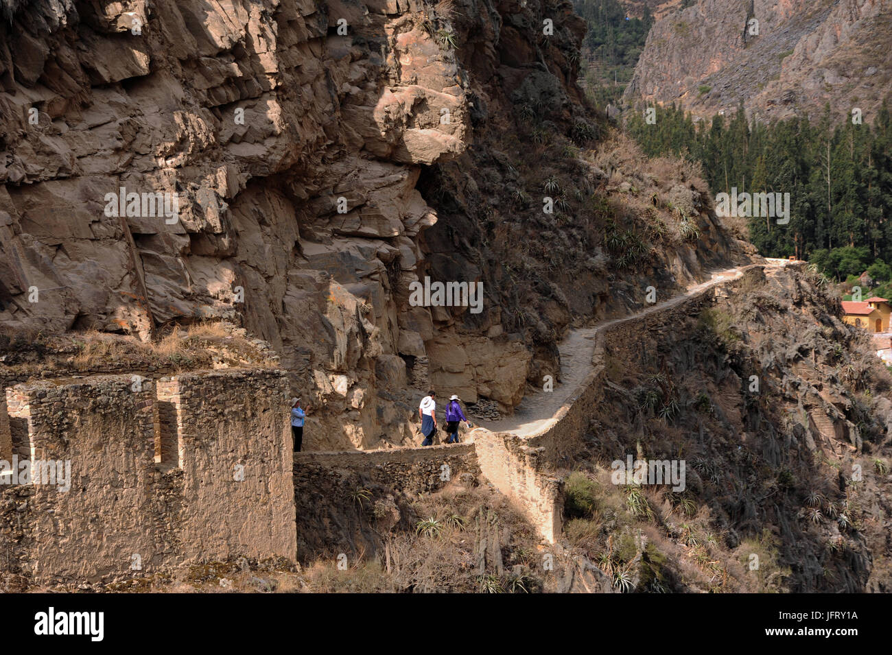 Above the town of Ollantaytambo tower the well-preserved remains of a ...