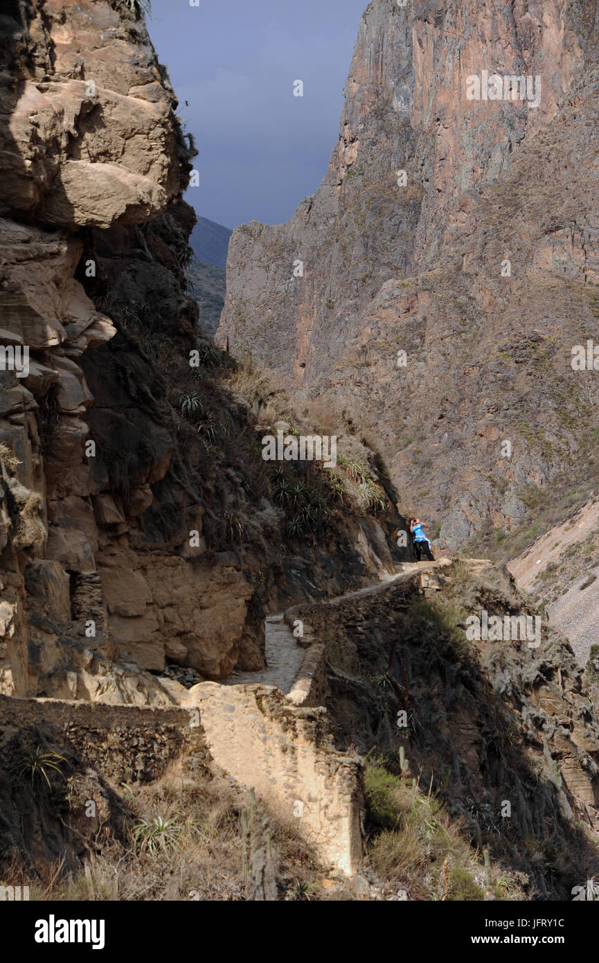 Above the town of Ollantaytambo tower the well-preserved remains of a ...