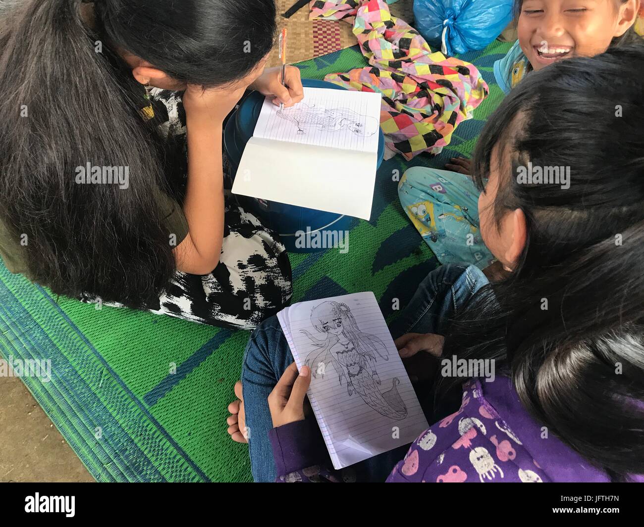 Kids pat-time inside Saguiaran evacuation site. (Photo by Sherbien ...