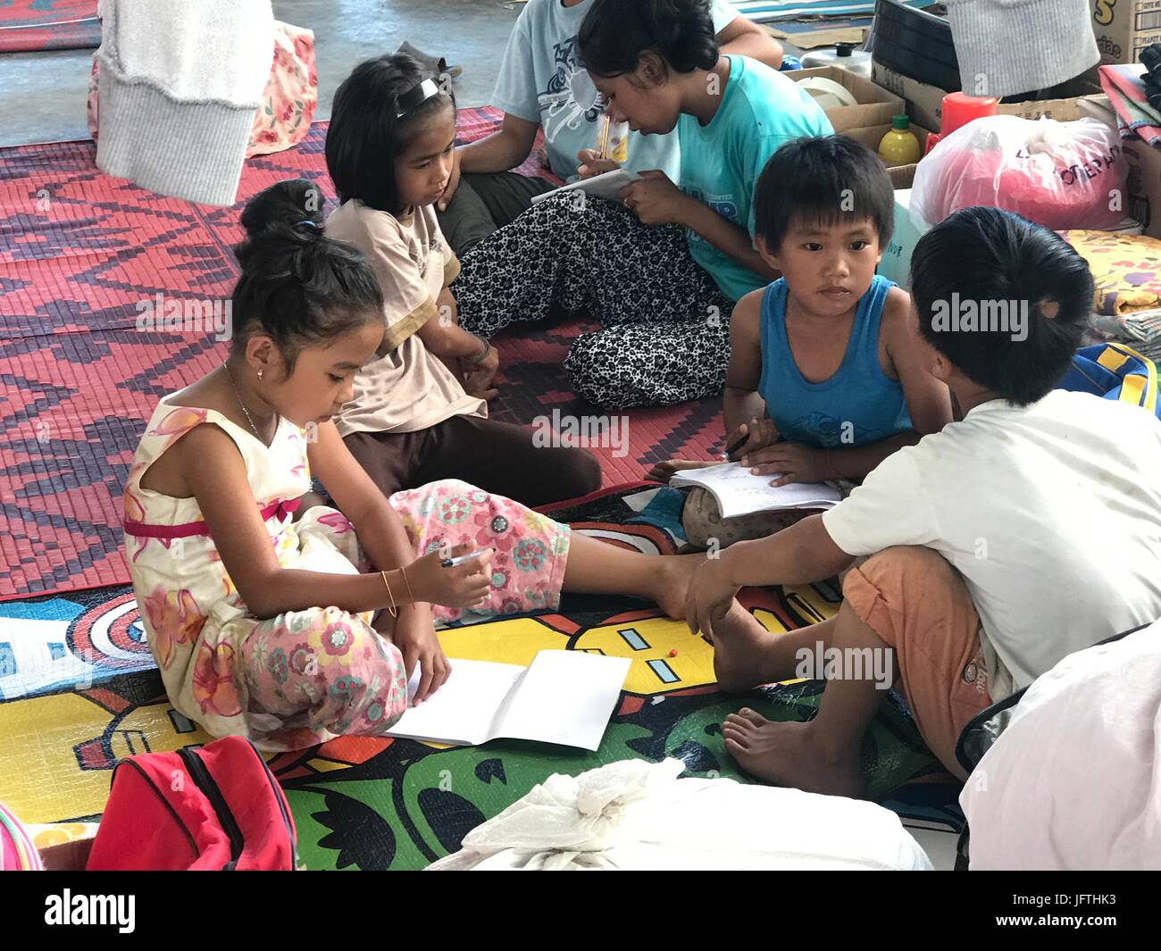 Kids studying inside Saguiaran evacuation site. (Photo by Sherbien ...