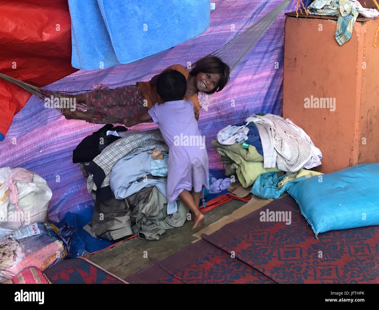 Kids draw, sleep or play as their past-time inside Saguiaran evacuation ...