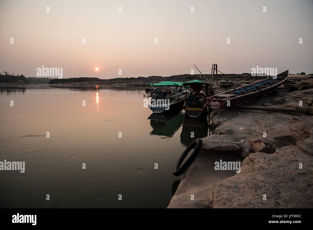 Longtail boat, Berth at sand Sam Pan Bok Grand Canyon in Maekhong river ...