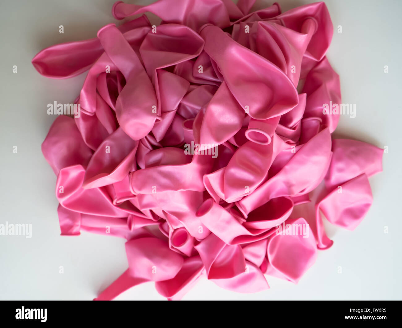 Deflated green balloon hi-res stock photography and images - Alamy