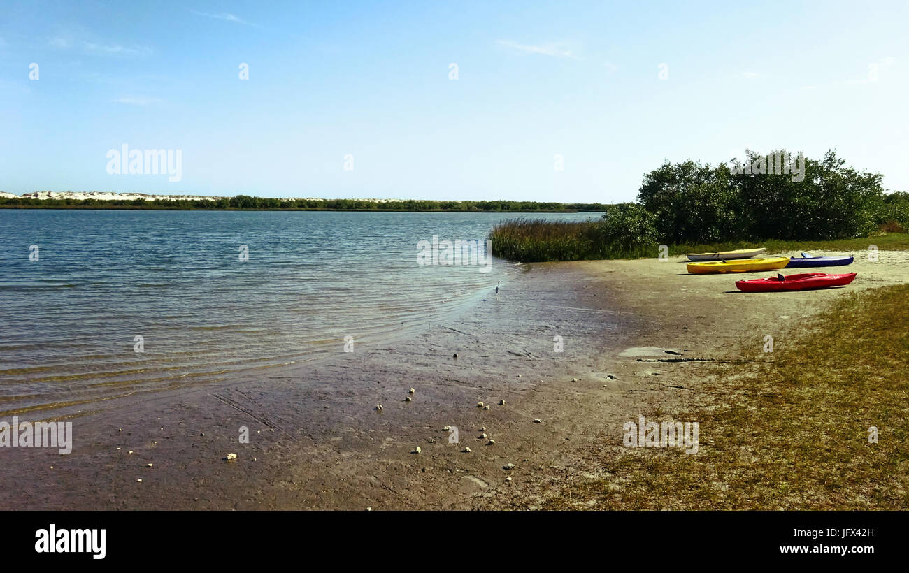 Canoes at Ocean Beach Inlet Stock Photo - Alamy