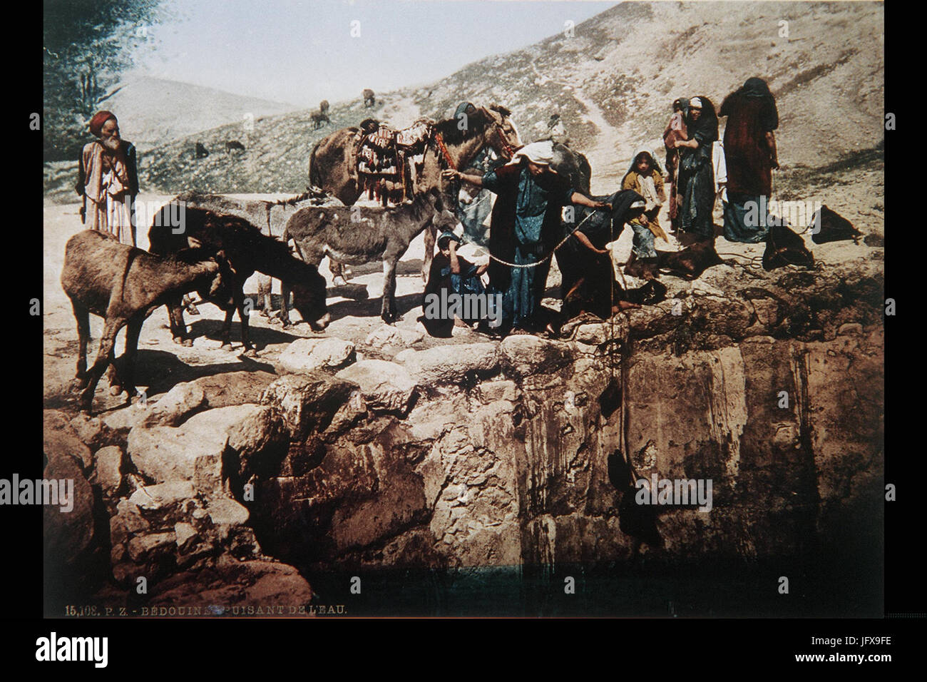 BEDUINS DRAWING WATER FROM A WELL (PROBABLY IN THE GALILEE). PHOTO ...