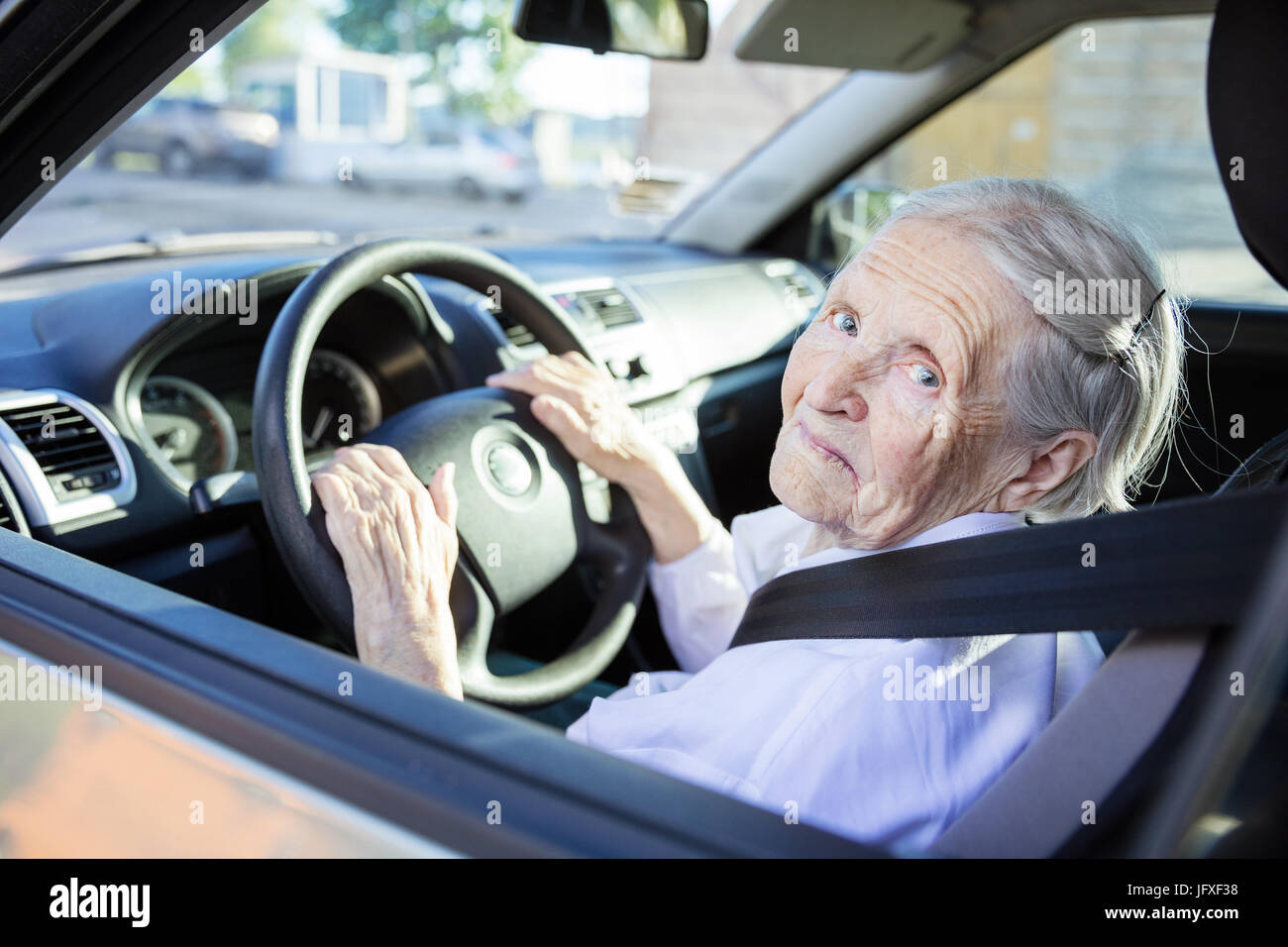 Old woman driving hi-res stock photography and images - Alamy