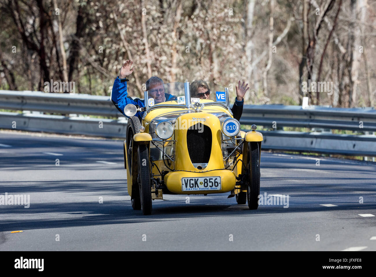 Vintage 1929 Austin 7 Meteor driving on country roads near the town of ...