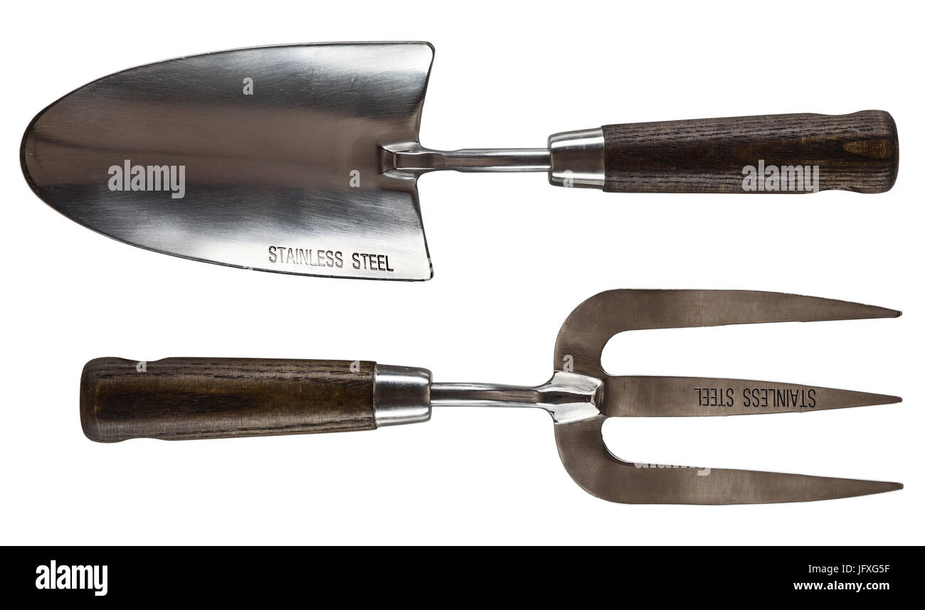 gardening hand fork and spade still life image on white background ...