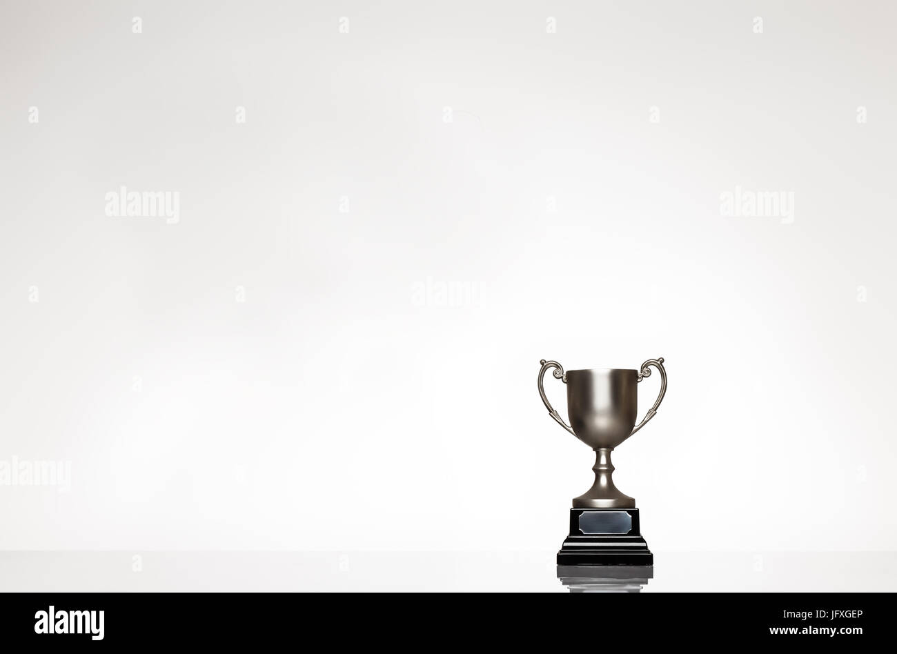 still life image of single trophy shot in the studio on white ...