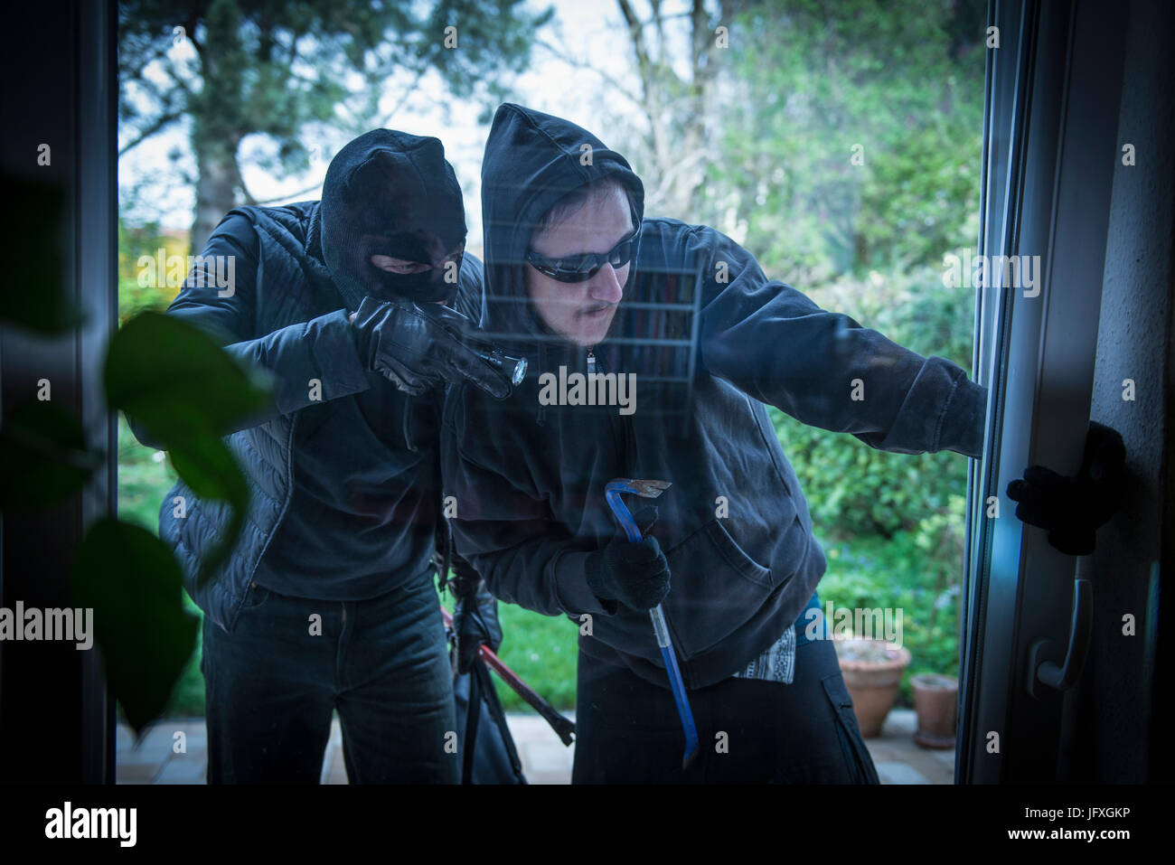 Two burglars hi-res stock photography and images - Alamy