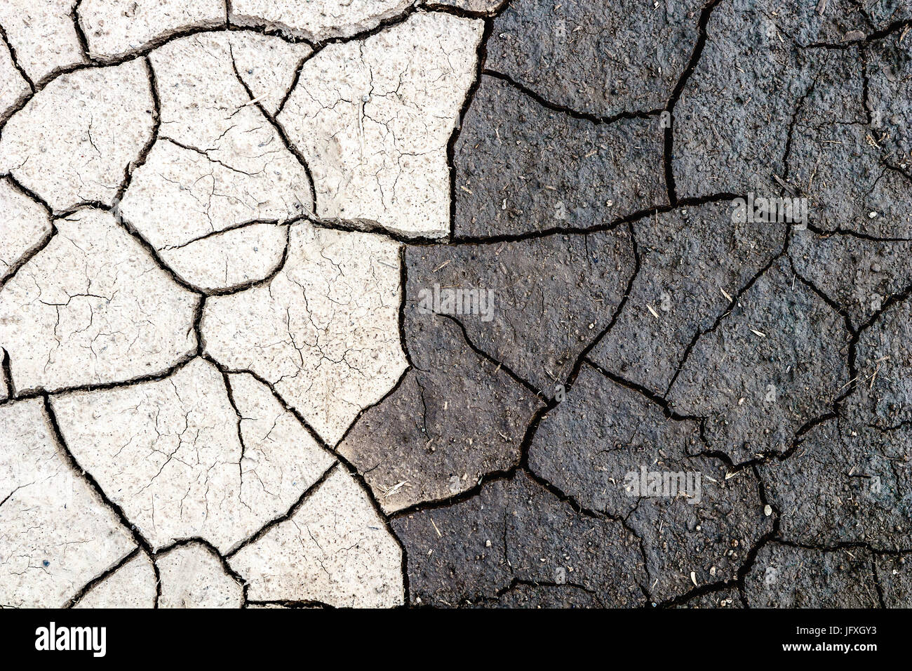 Nature background, border of dry and wet cracked mud. Concept of ...