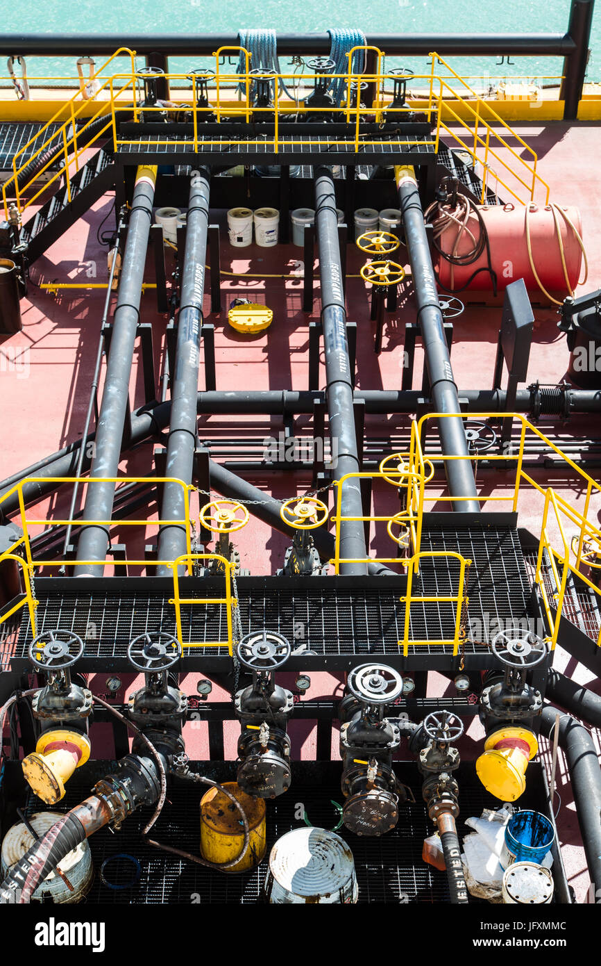 Pipes and valves on an industrial oil and fueling barge Stock Photo - Alamy