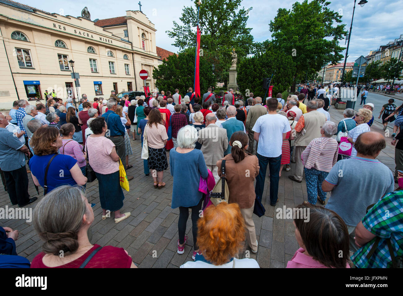 A public prayer in the old part of Warsaw, Poland Stock Photo - Alamy