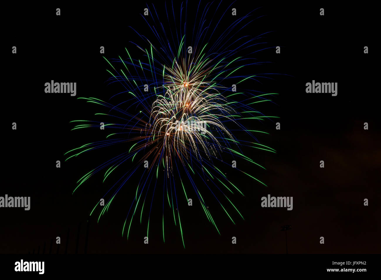 Fireworks light up summer night sky for the Fourth of July celebration ...