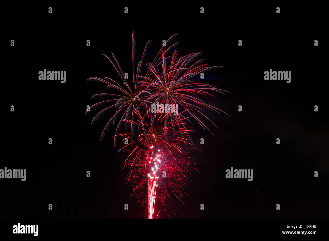 Fireworks light up summer night sky for the Fourth of July celebration ...