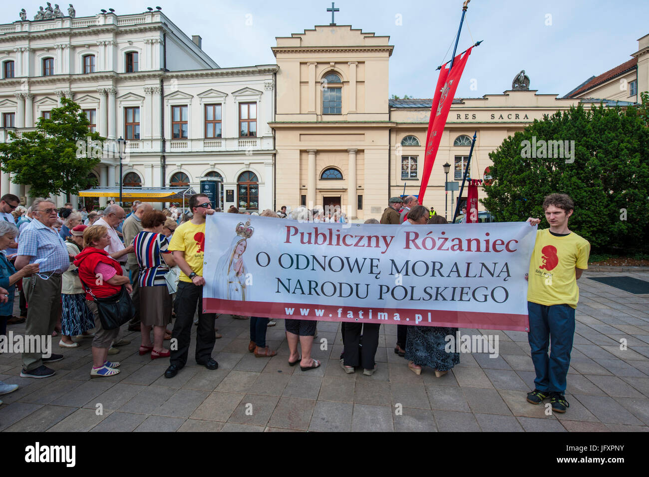 A public prayer in the old part of Warsaw, Poland Stock Photo - Alamy