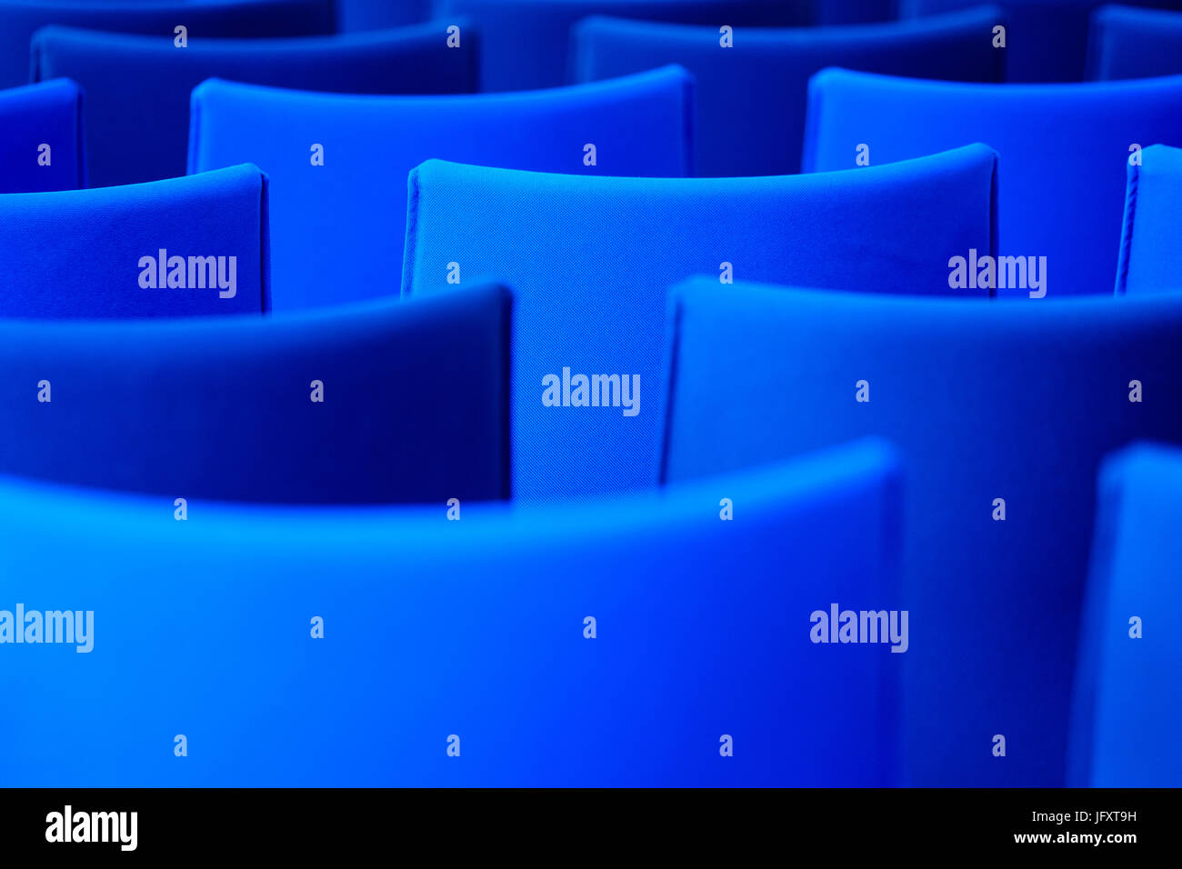 Blue chairs in the conference hall Stock Photo - Alamy