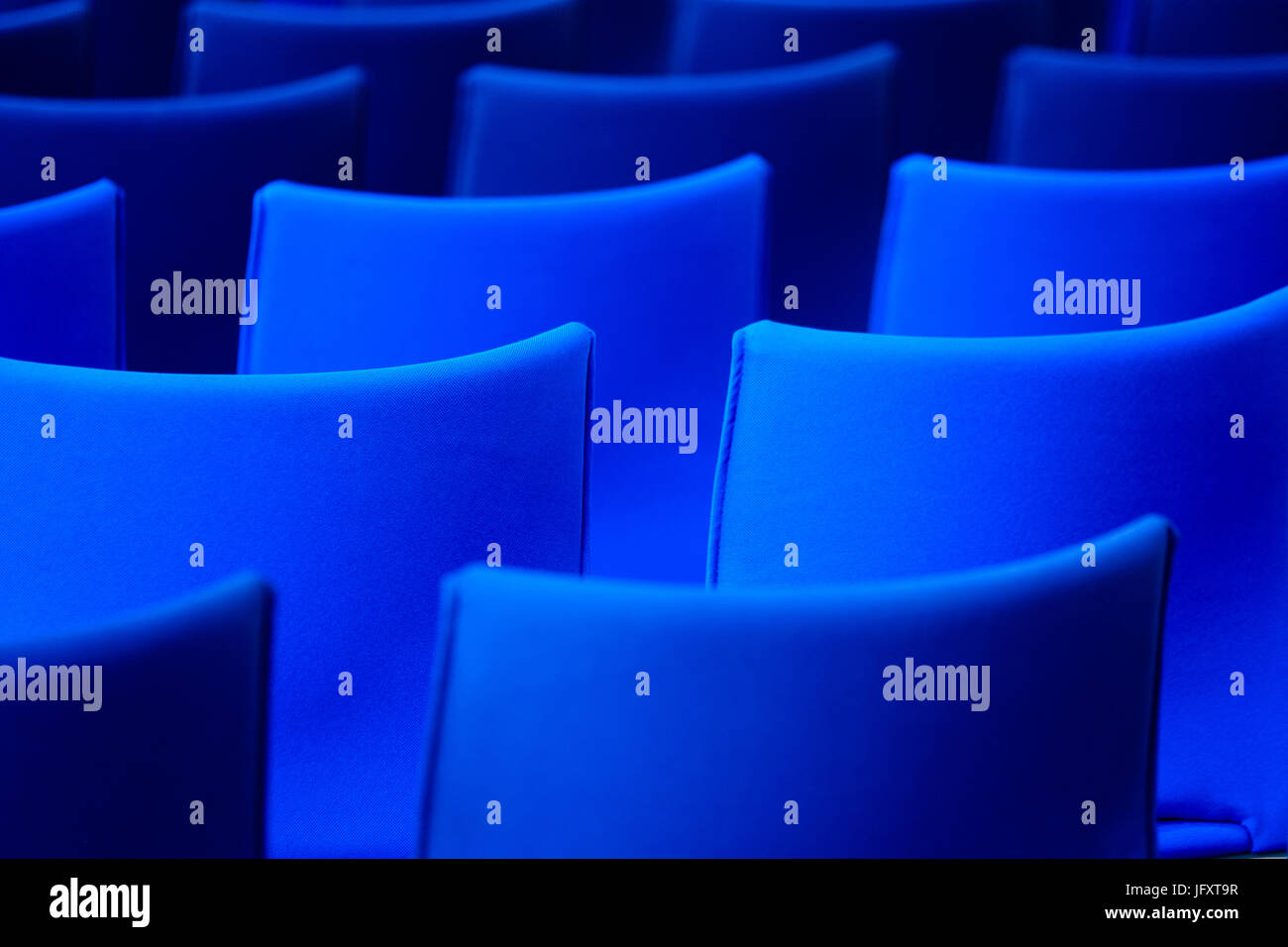 Blue chairs in the conference hall Stock Photo - Alamy