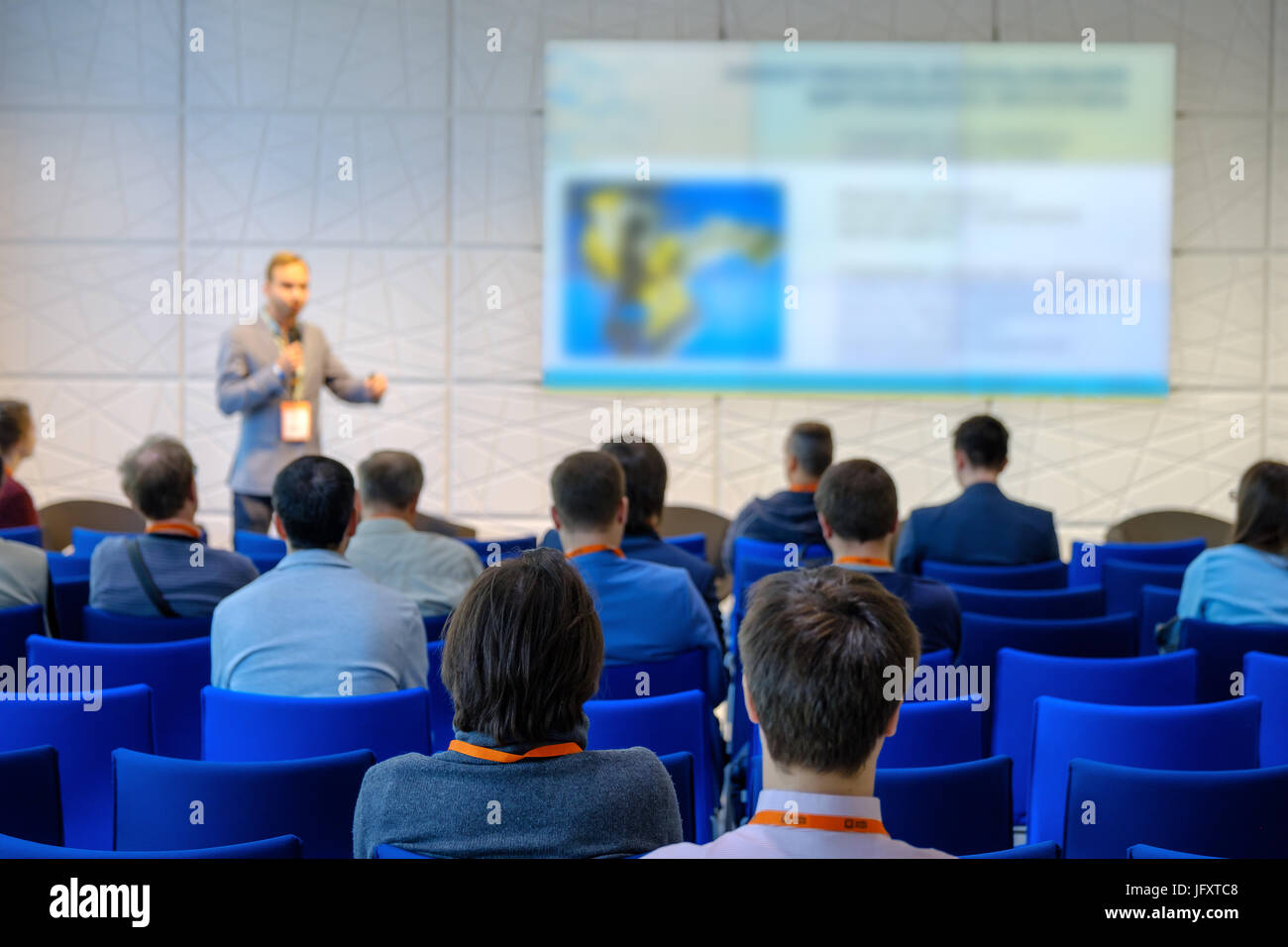 Audience listens to the lecturer Stock Photo - Alamy