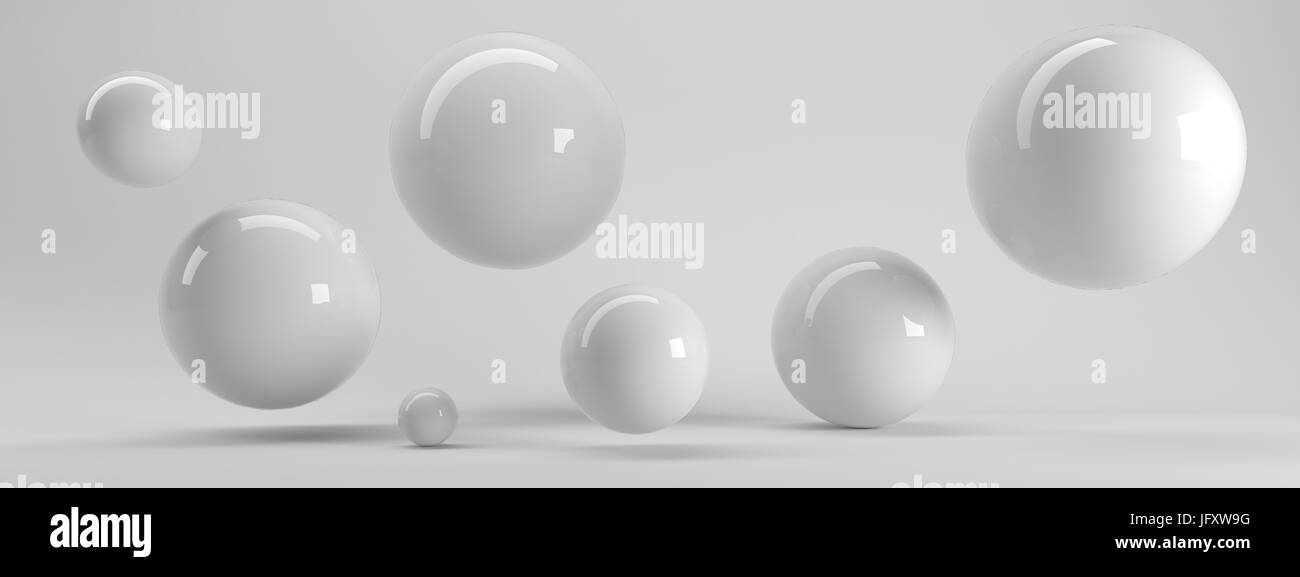 3d rendering of several sized reflected spheres inside a white studio ...