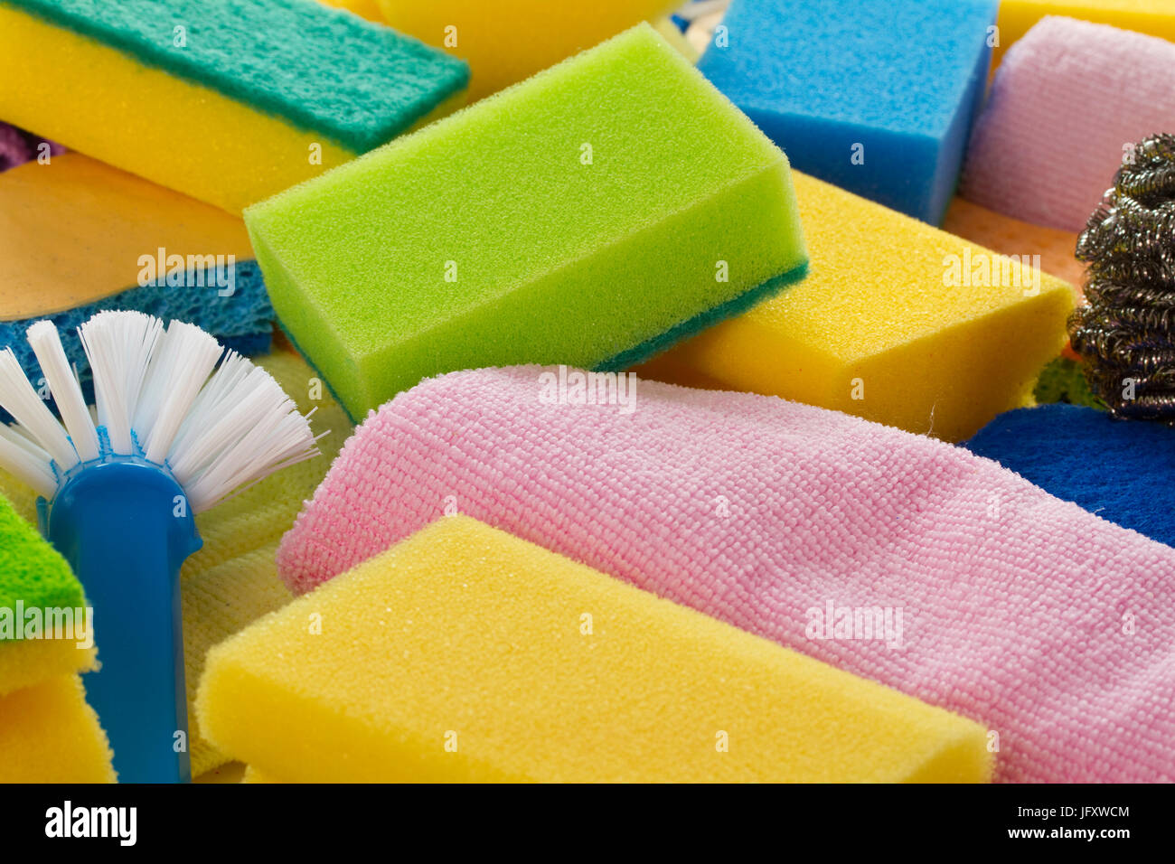 Colorful sponges in detail as background Stock Photo - Alamy