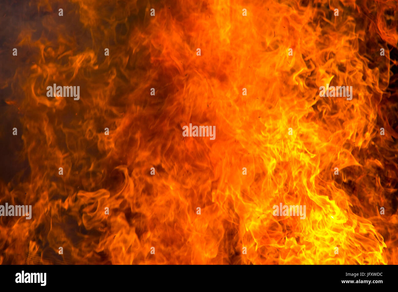 Outdoor burning fire and open flame. Black-orange background Stock ...