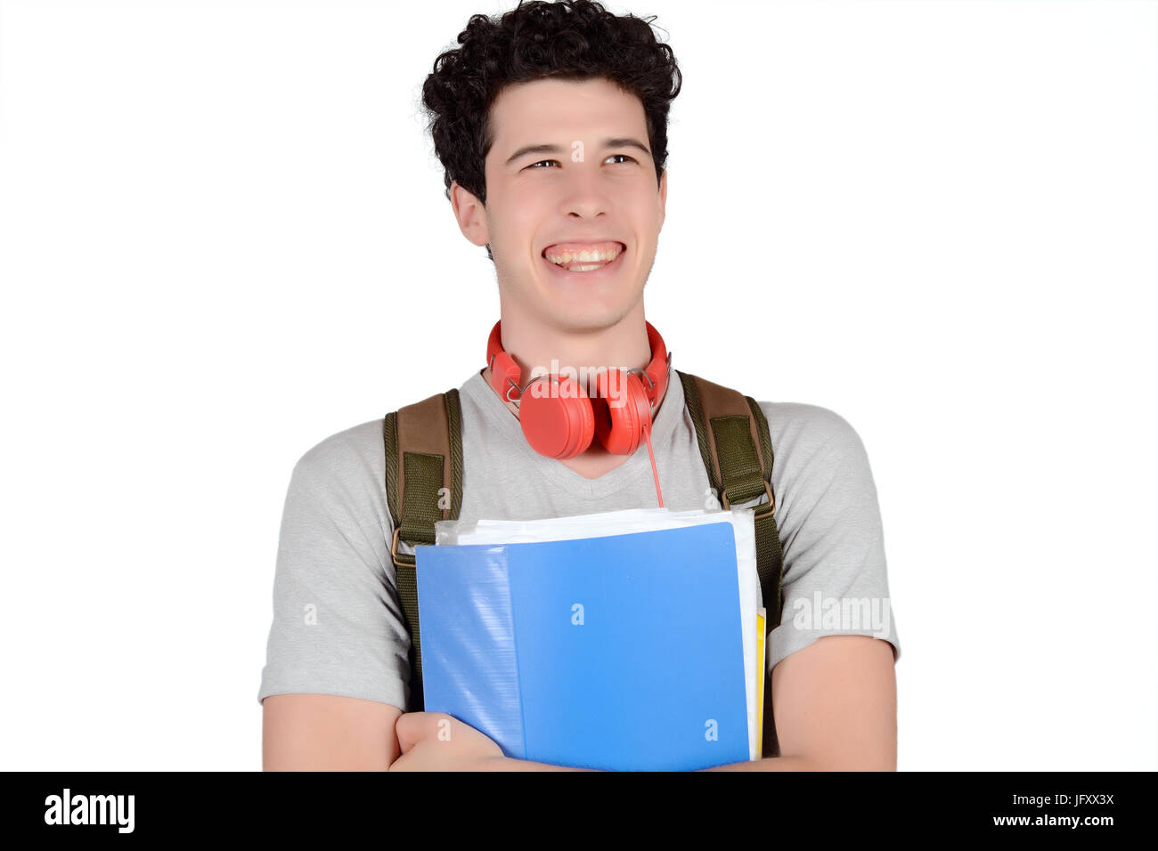 Portrait of young student holding notebook. Isolated white background ...