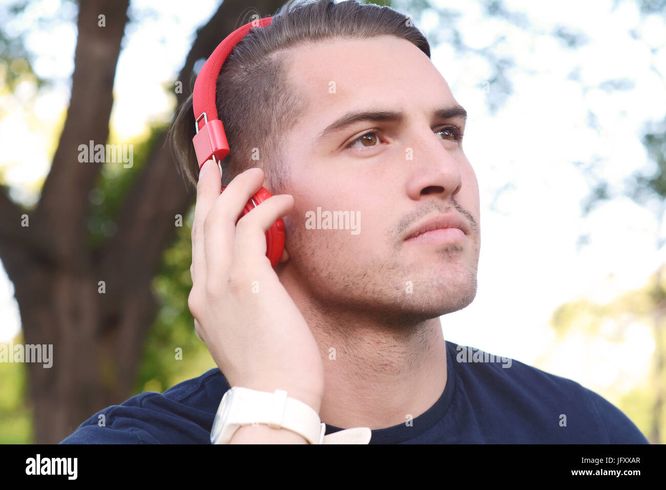 Beautiful young caucasian man headphones hi-res stock photography and images - Alamy
