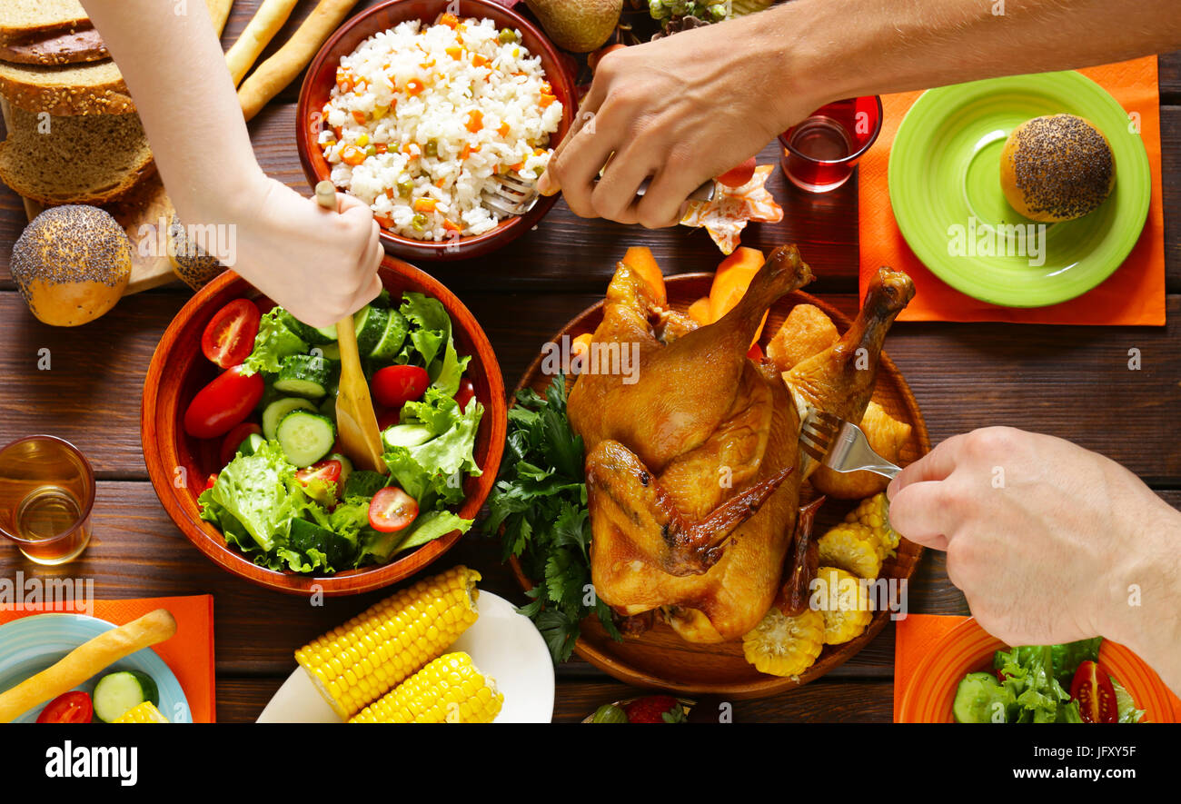 Happy Thanksgiving! Festive table with baked chicken and corn Stock ...