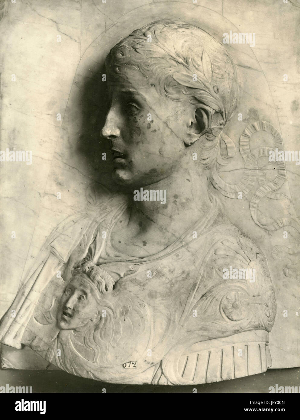 A Young Hero, marble bas-relief by Desiderio da Settignano, Italy Stock ...