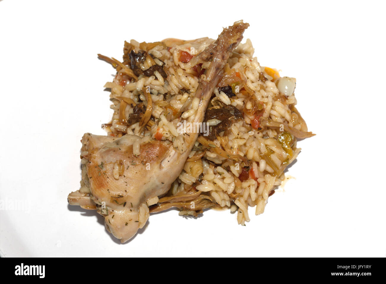 Rice with rabbit and mushrooms Stock Photo - Alamy