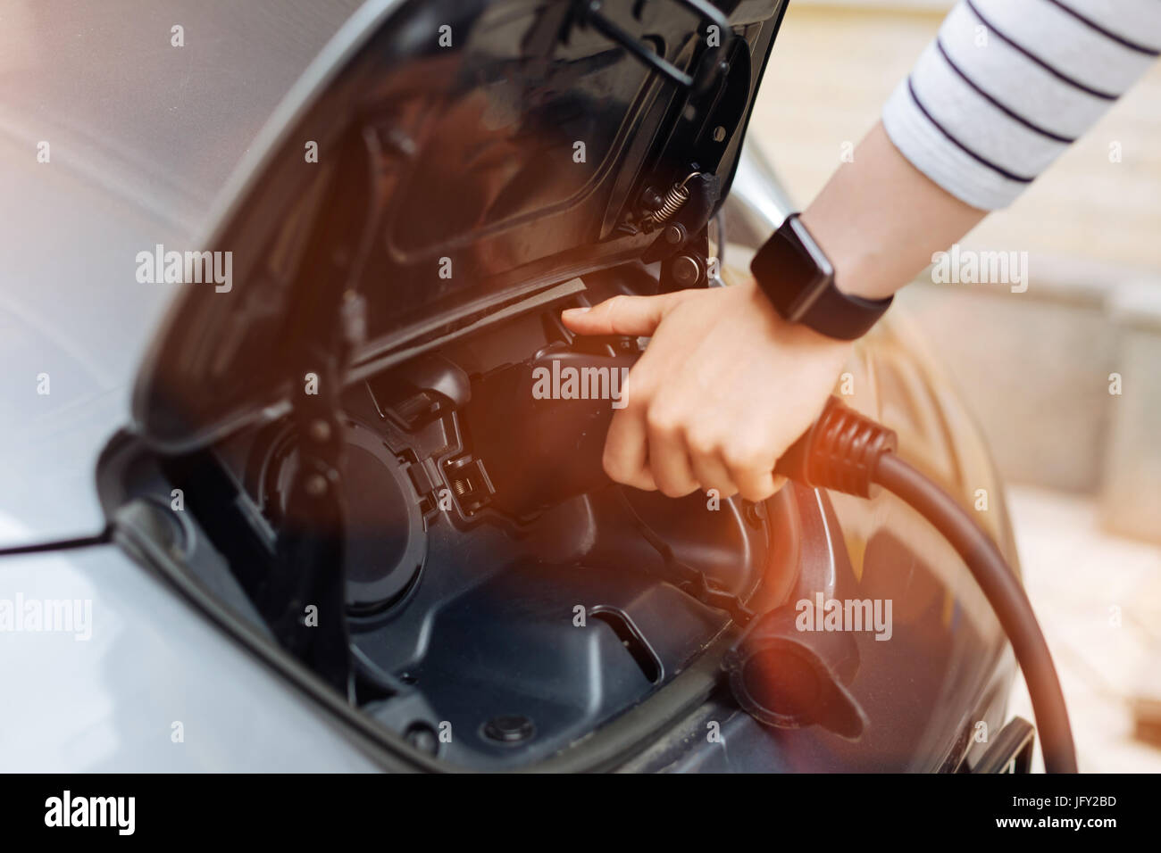 Female plugging hi-res stock photography and images - Alamy