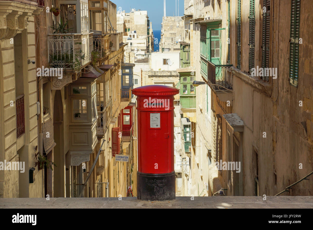 A photograph of an old British postbox standing in Valletta, Malta. The ...