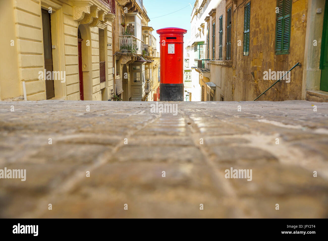 A photograph of an old British postbox standing in Valletta, Malta. The ...