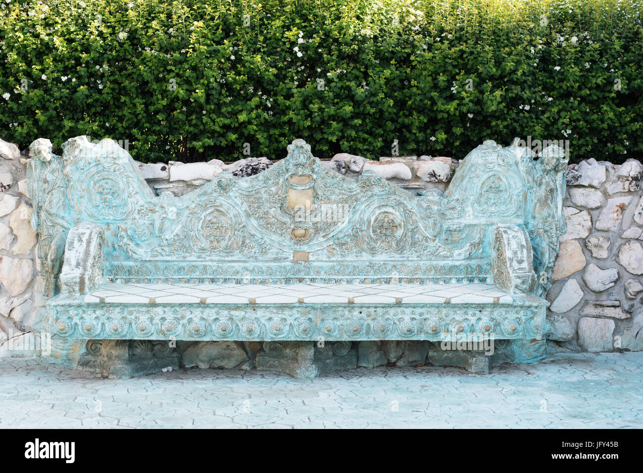 Ancient medieval baroque stone bench. Stone walkway. Alley in beautiful ...