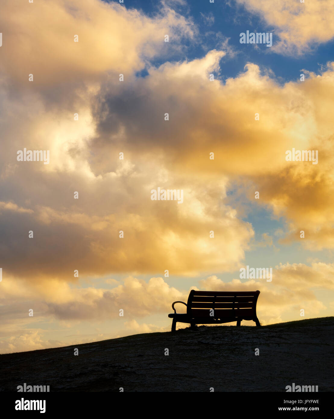 Bench with sunrise clouds. Kailua Beach Park, Oahu, Hawaii Stock Photo ...