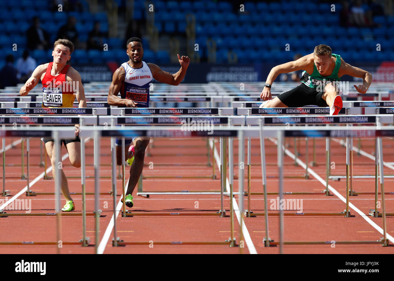 David King (right) wins the men's 110 Metres Hurdles Final during day ...