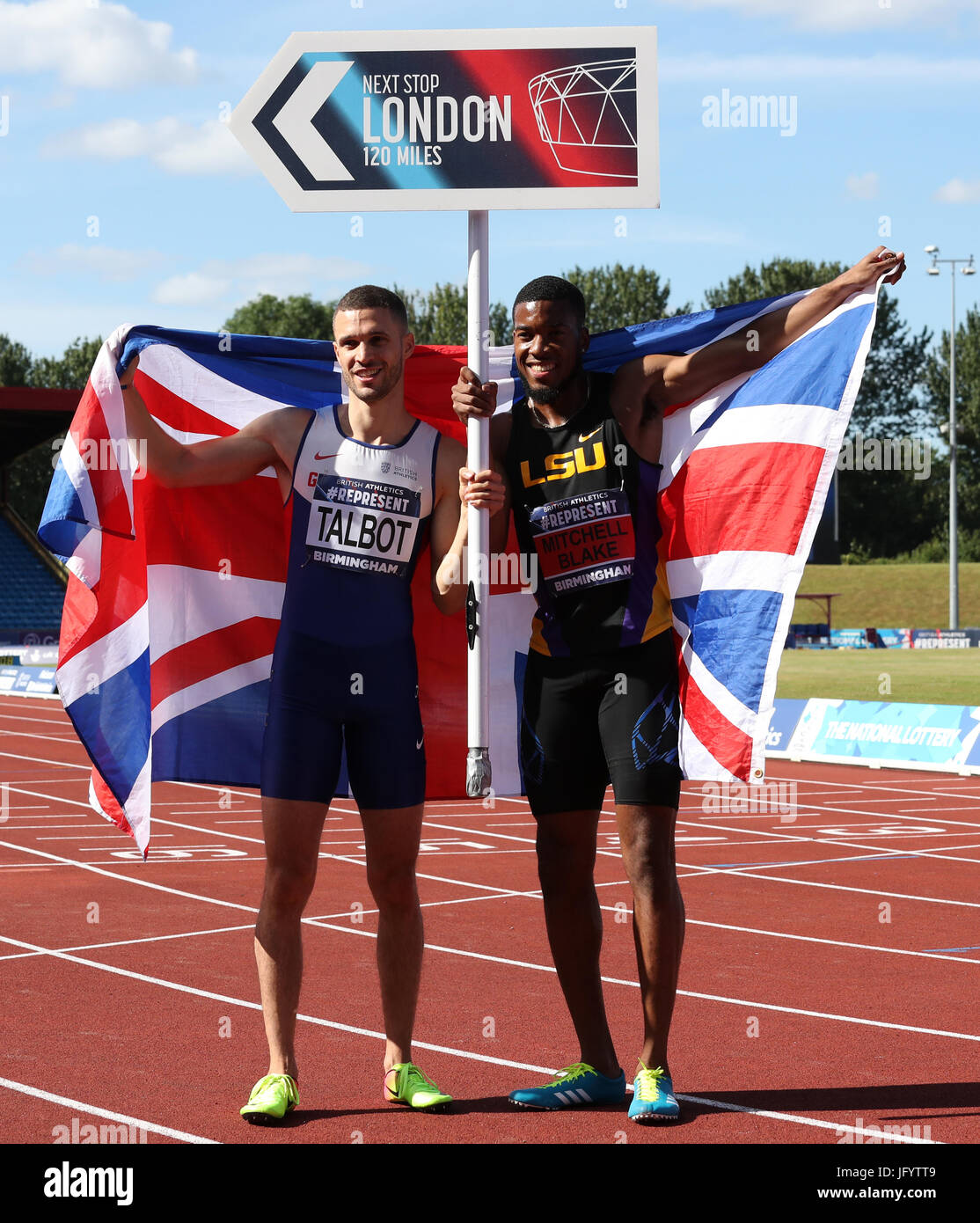 Nethaneel Mitchell-Blake (right) celebrates winning the men's 200 ...